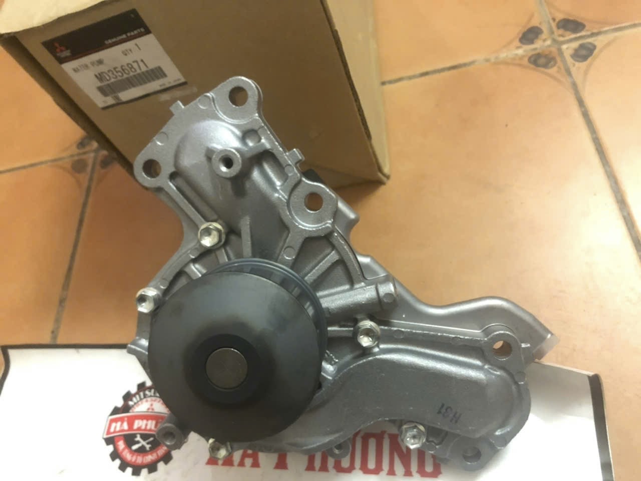 bơm nước xe mitsubishi pajero v93, v73 2005- 2010 hàng xịn chính hãng ...